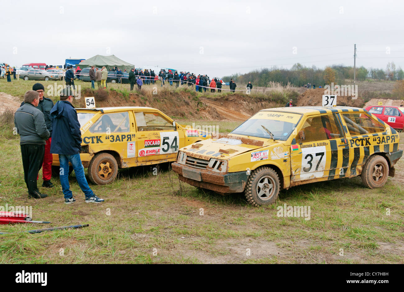 Two yellow racing car Stock Photo - Alamy