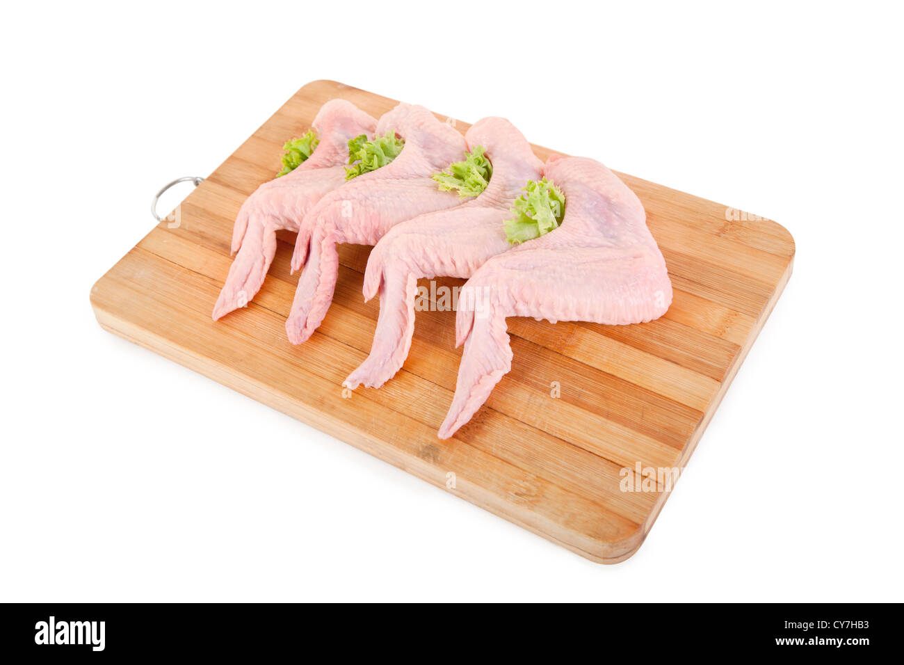 Raw chicken wings with green salad, isolated on white background ...