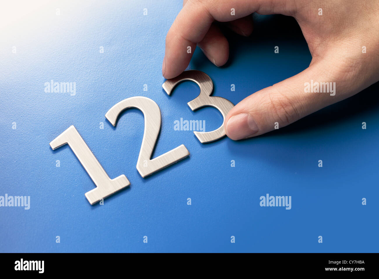 Man adding numbers in order Stock Photo - Alamy