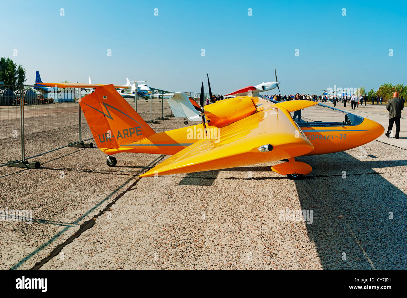 Light two-engine airplane for cruising and training on yellow colour ...