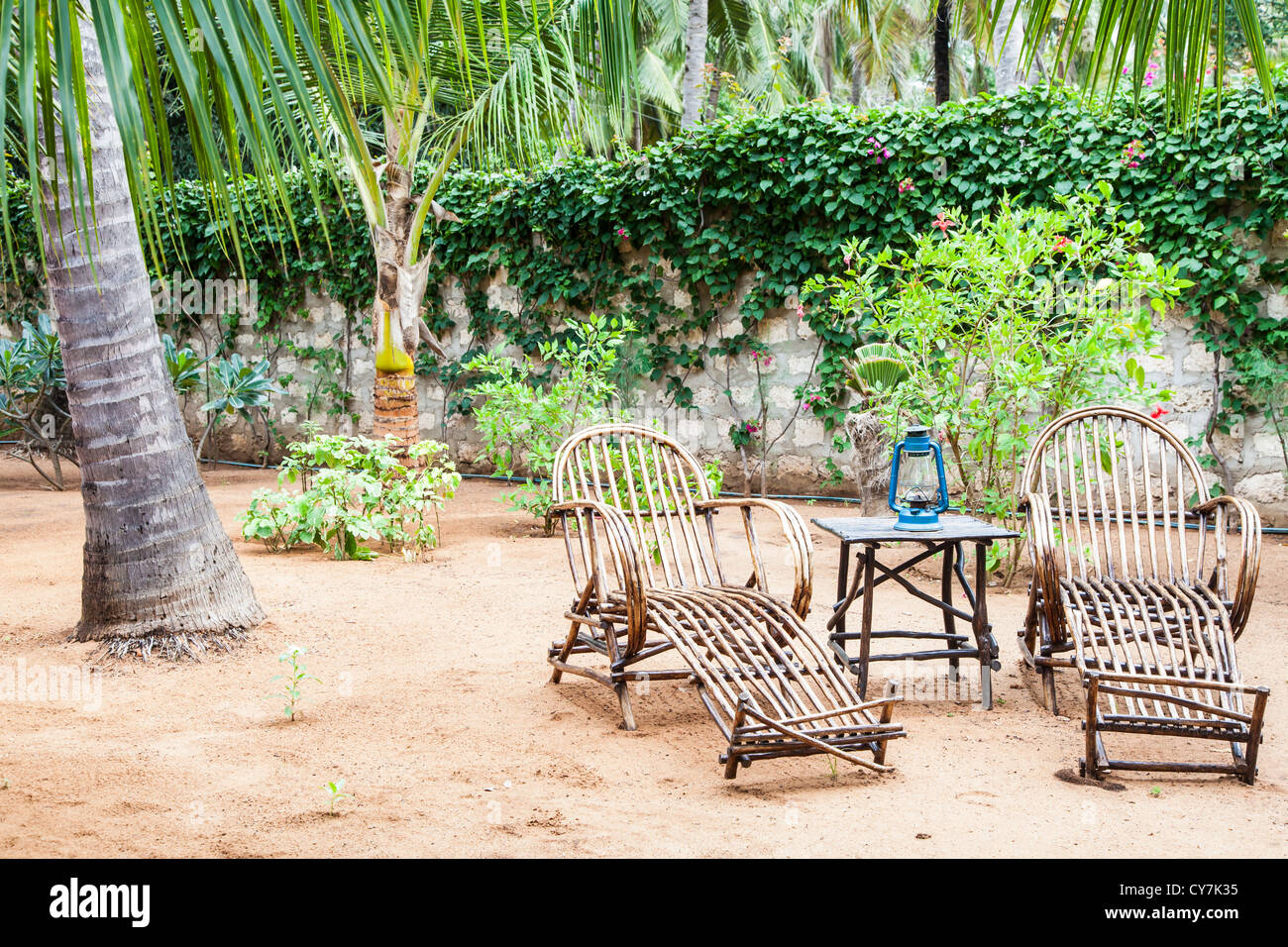 Kenya. Elegant furniture made of wood in an African garden Stock Photo ...