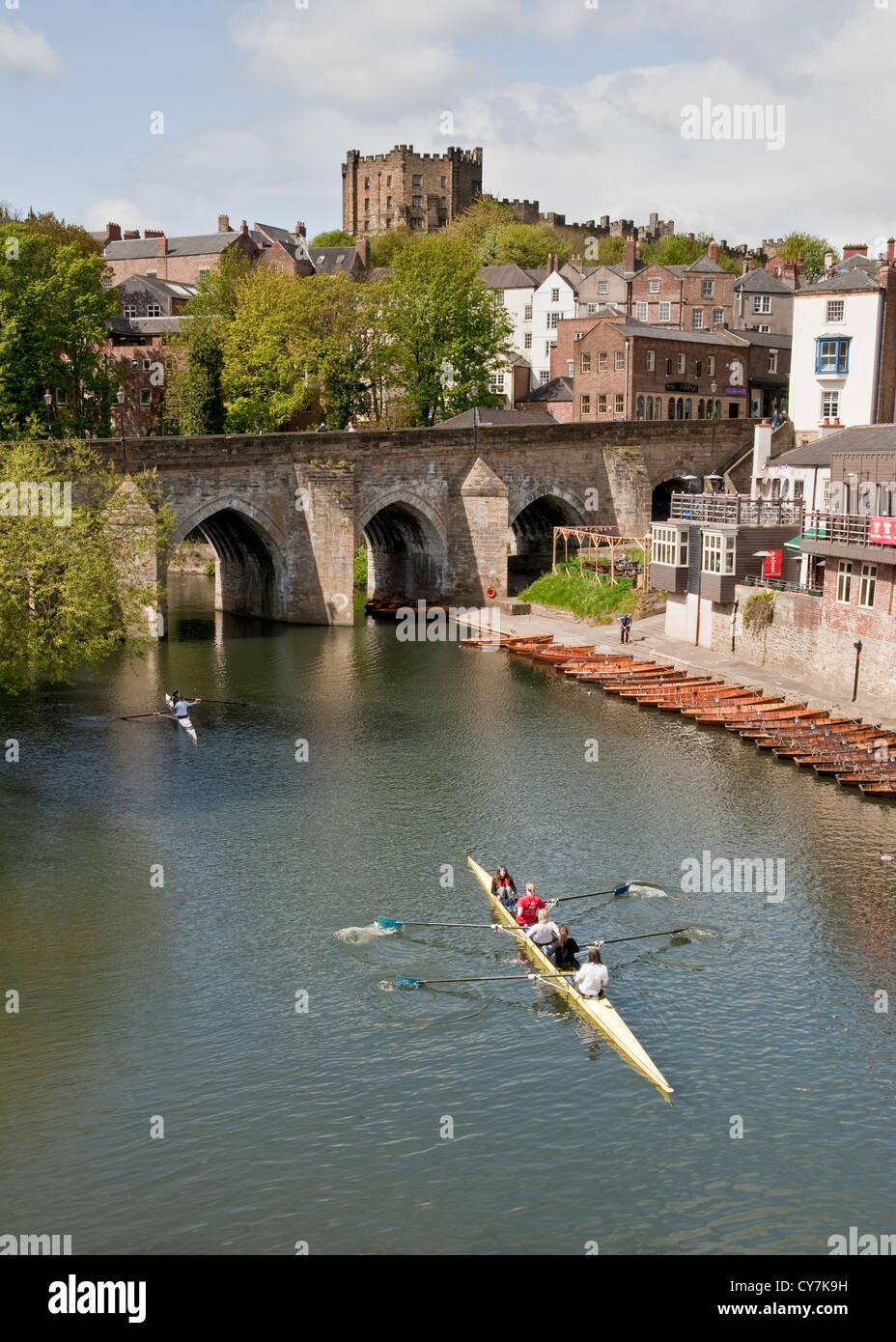 University rowers on the River Wear in Durham City. With Durham castle ...
