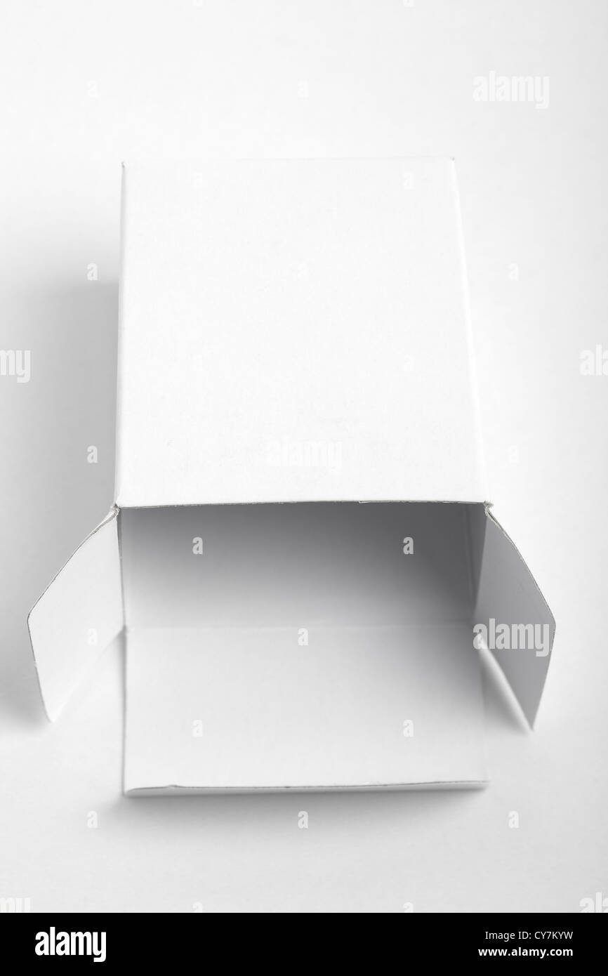 Close up of a small white cardboard box , isolated on white background ...