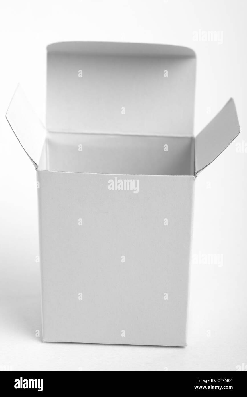 Close up of a small white cardboard box , isolated on white background ...