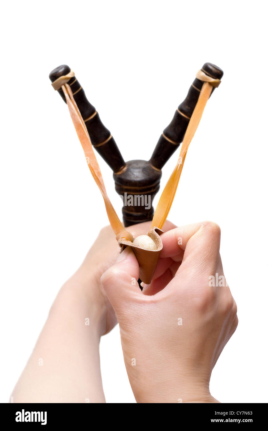 Hand Holding Aiming Slingshot Stock Photo - Alamy