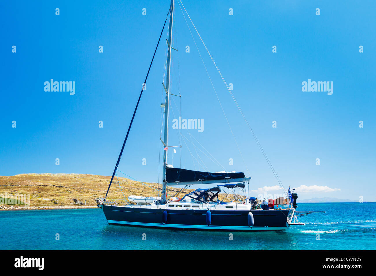 Sail Boat in Tropical Blue Ocean Stock Photo - Alamy