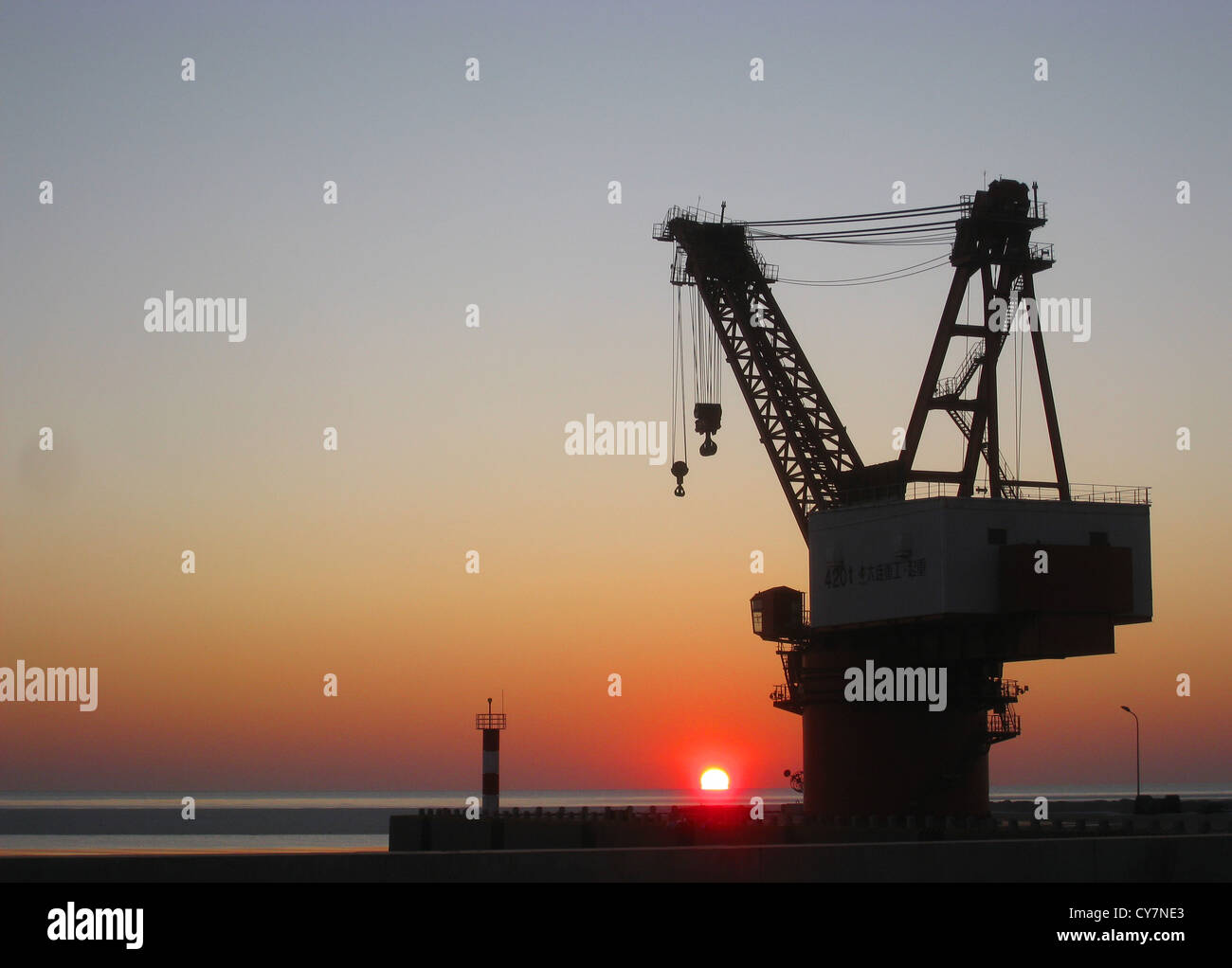 The sunset of the port Stock Photo - Alamy