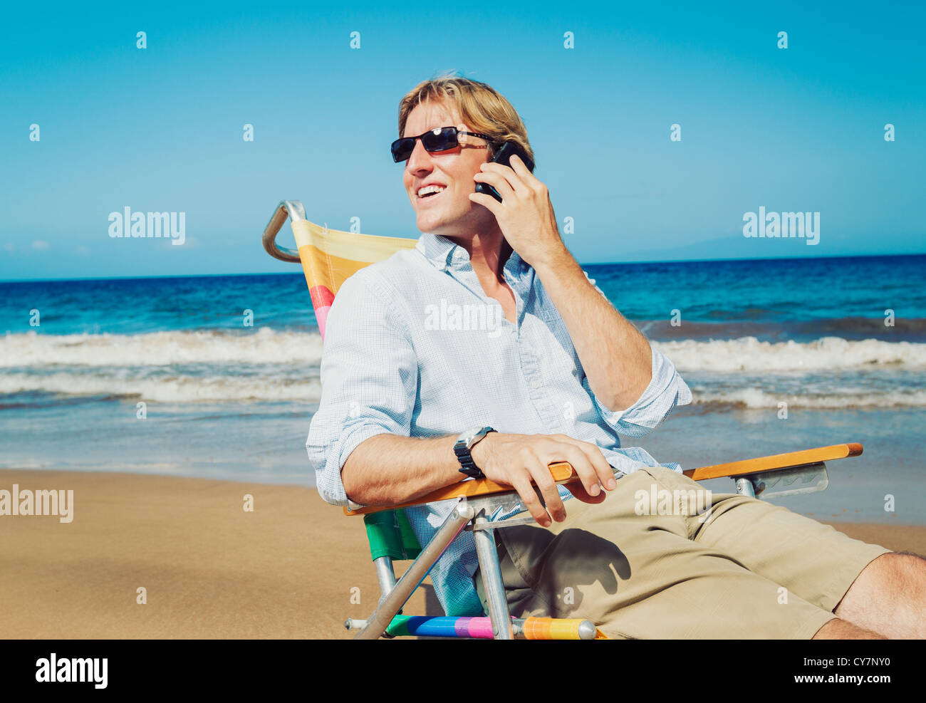 Young Business Man Working Remotely on Tropical Beach Stock Photo - Alamy