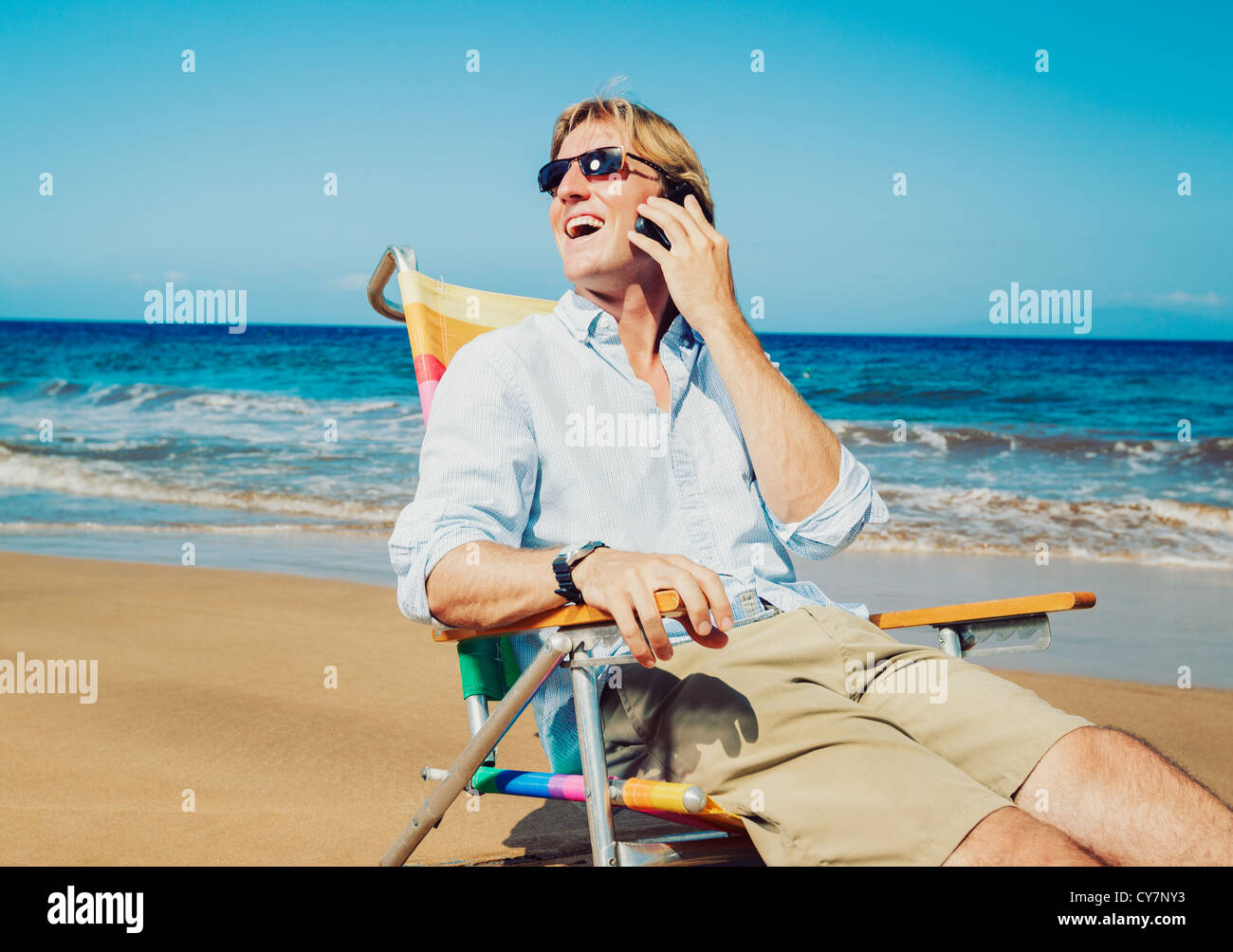 Young Business Man Working Remotely on Tropical Beach Stock Photo - Alamy