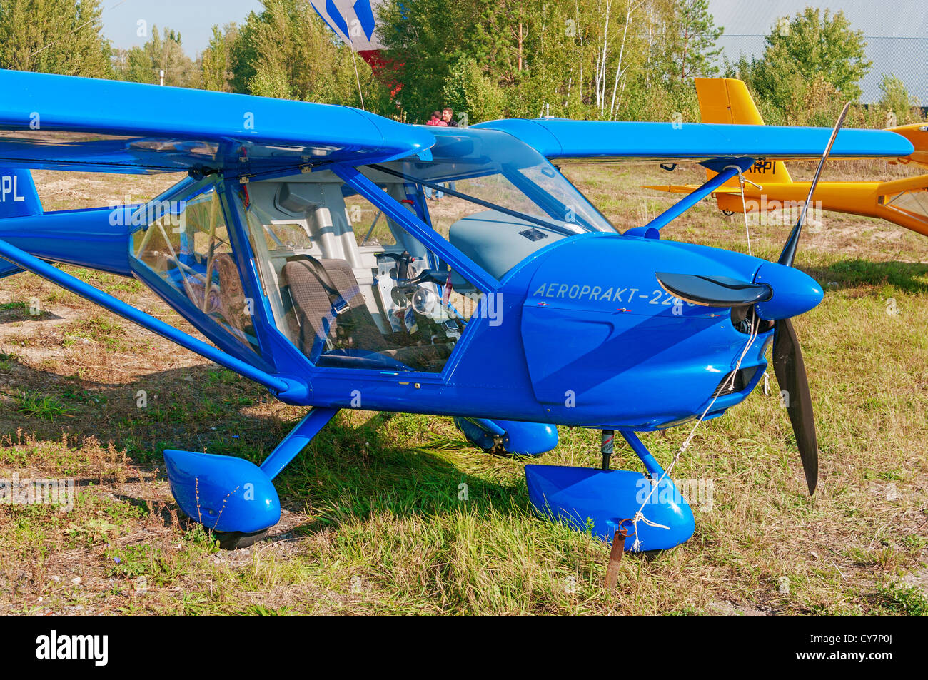 Light airplane for cruising and training on blue colour Stock Photo - Alamy