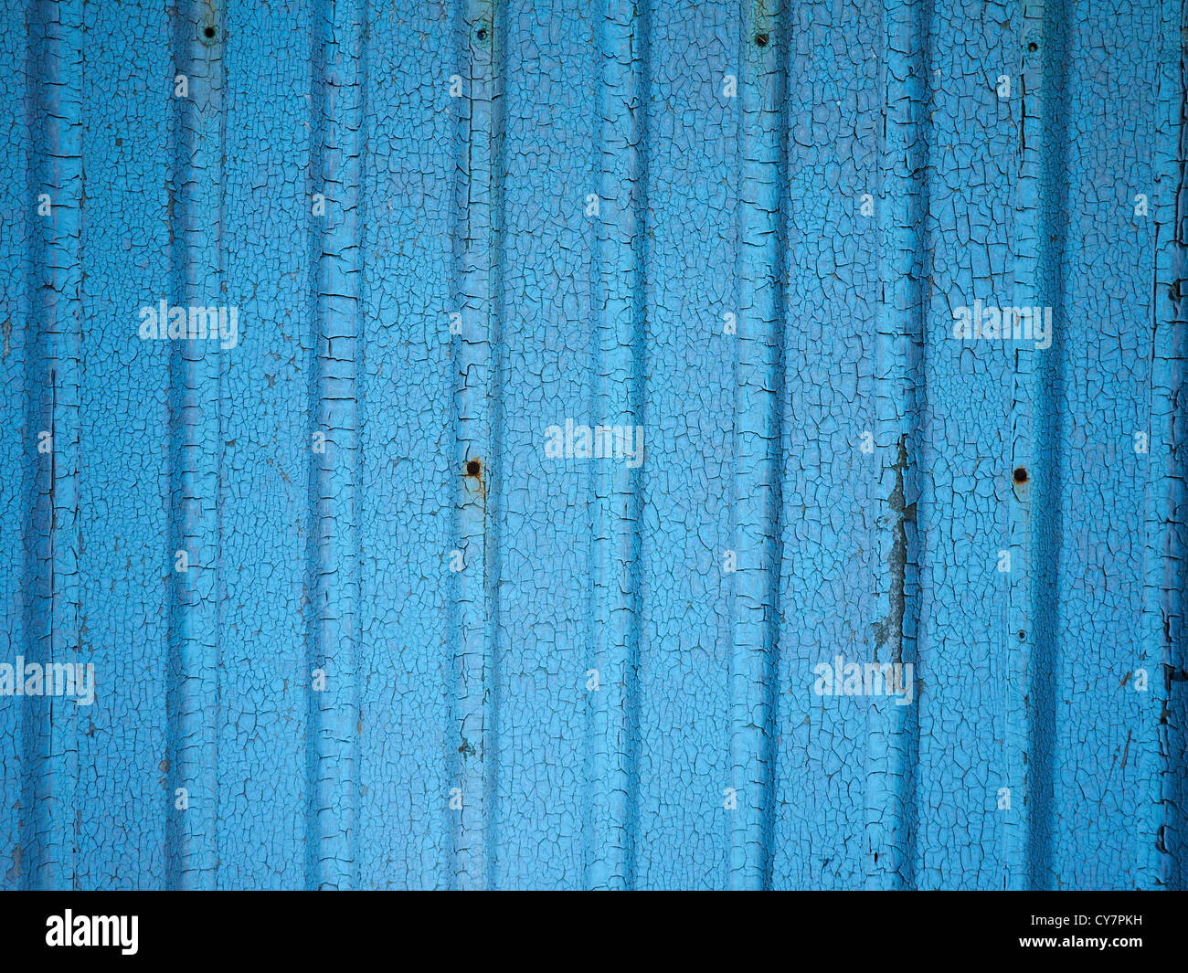 Blue painted corrugated metal fence Stock Photo - Alamy