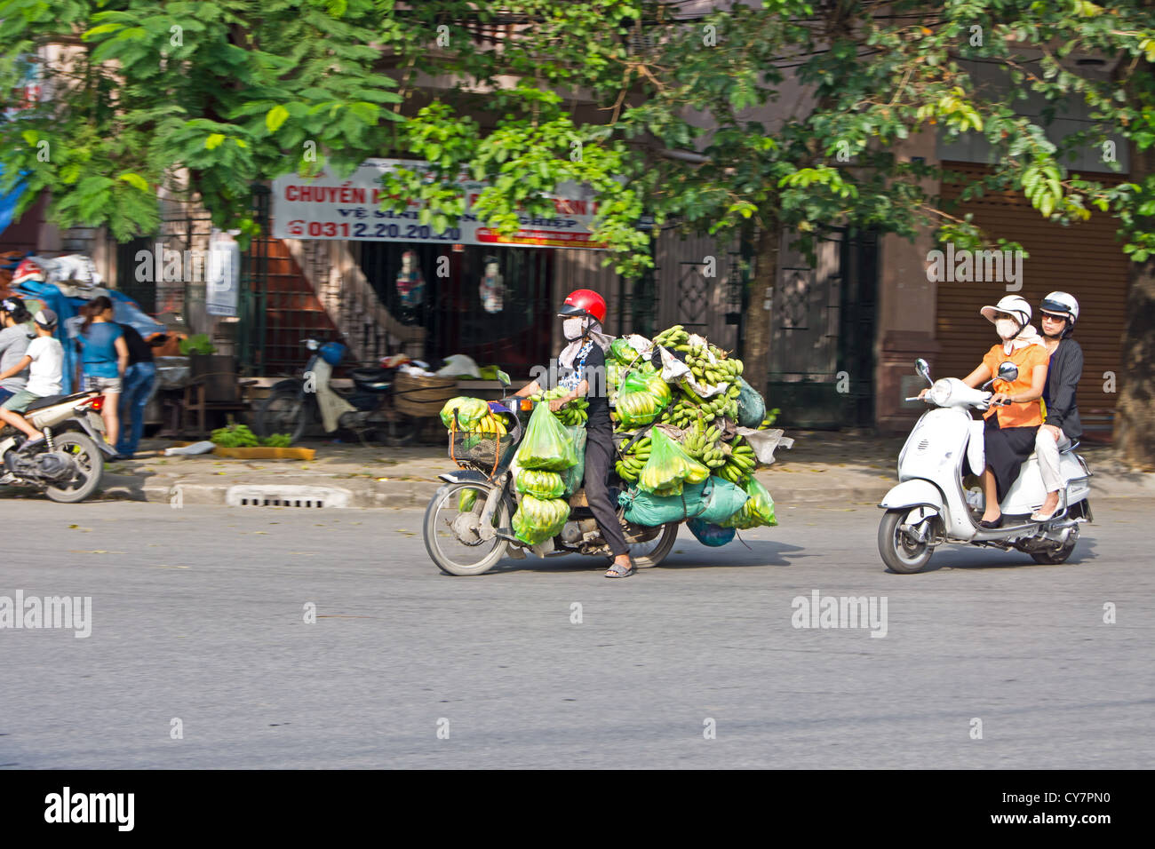 Overloaded scooter hi-res stock photography and images - Alamy