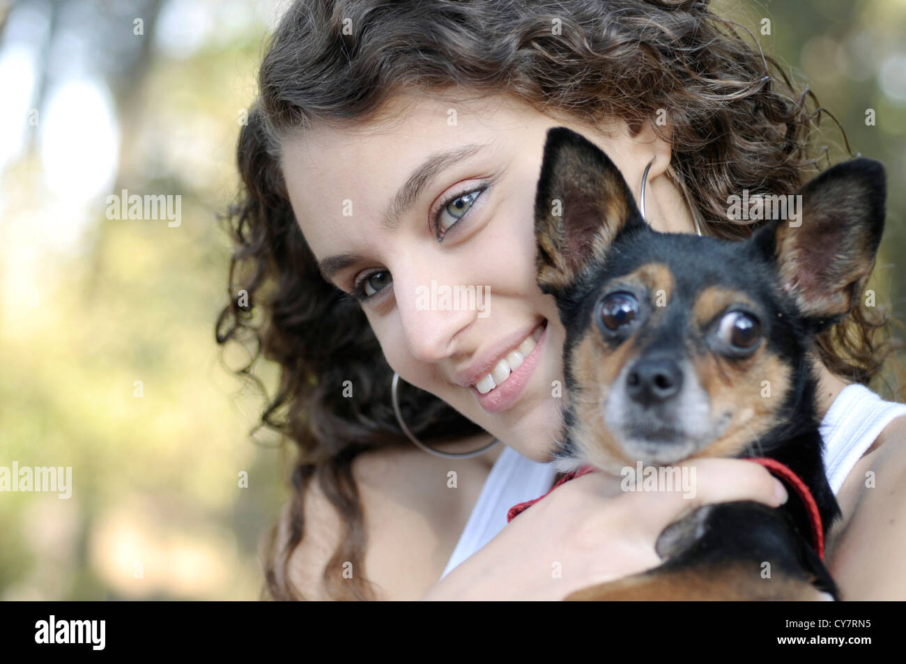 Woman with pet dog Stock Photo - Alamy