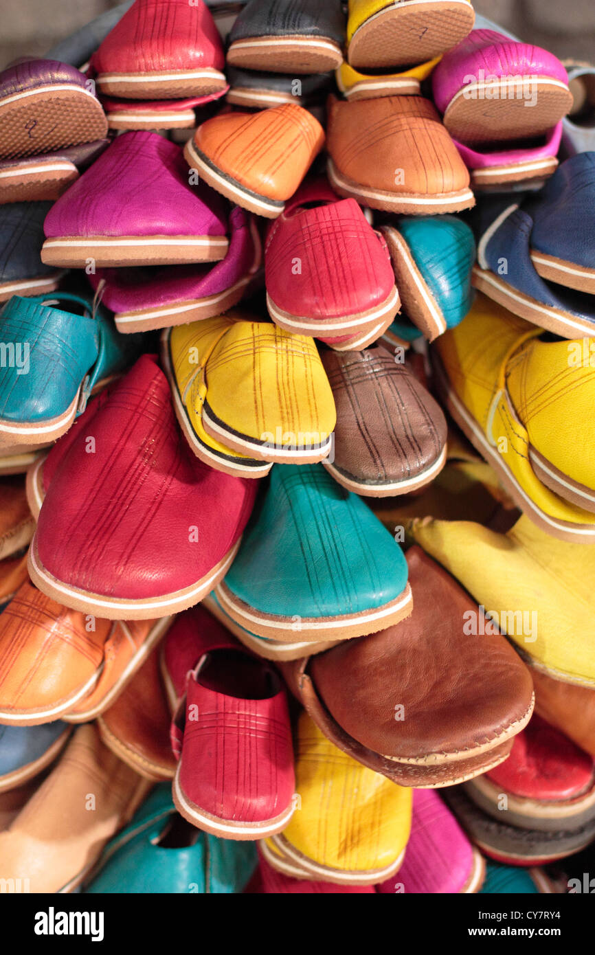 Lots of different coloured shoes in the souq of Marrakesh, Morocco ...
