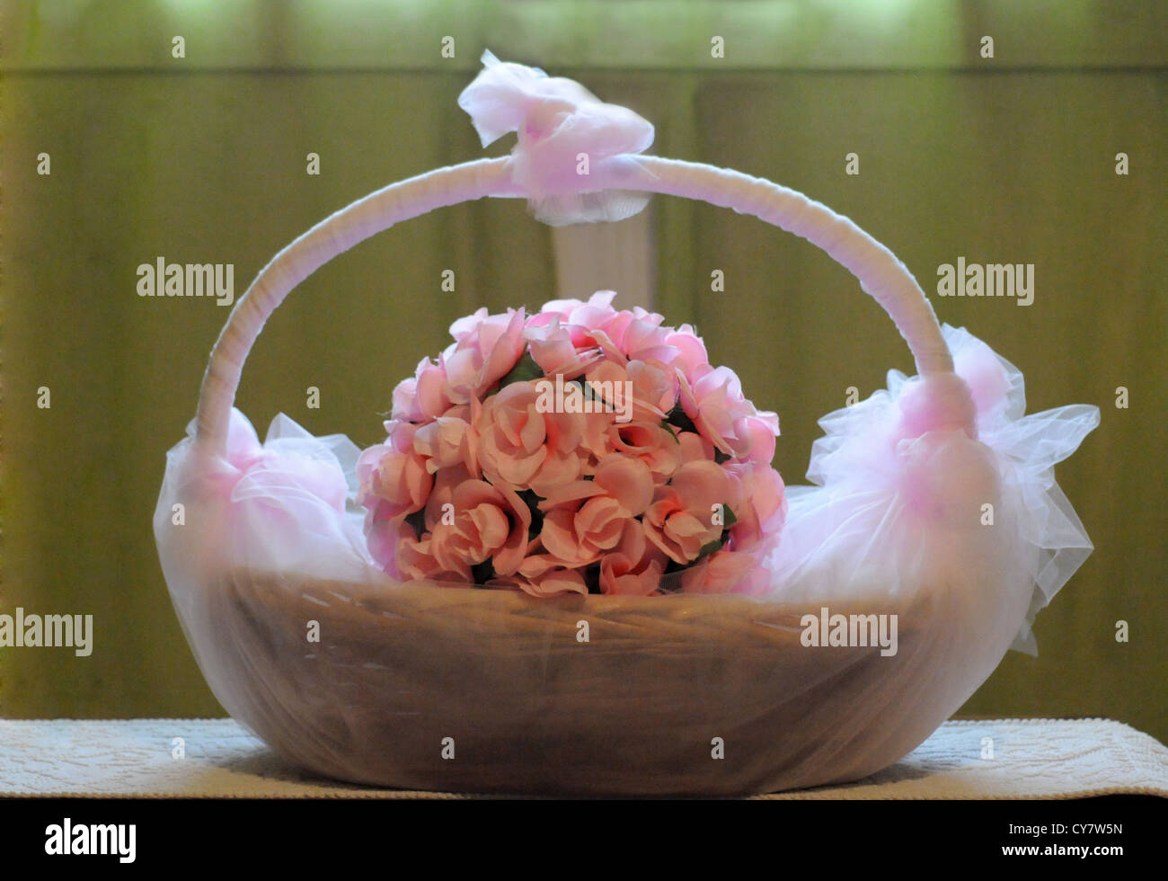 Pink roses in basket Stock Photo - Alamy