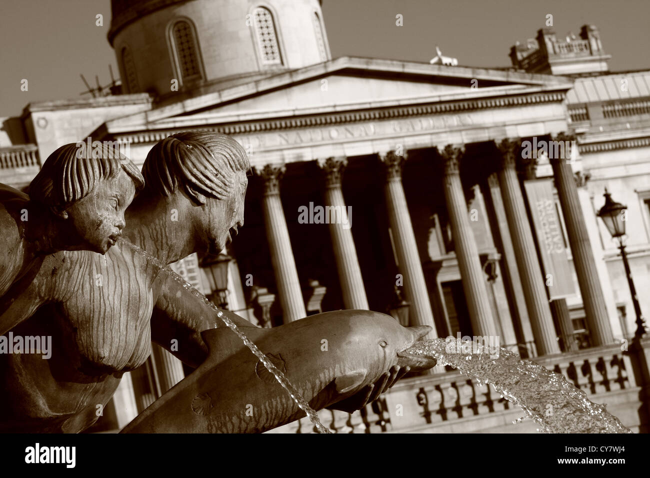 Part of a water sculpture in Trafalgar Square, London, with The ...