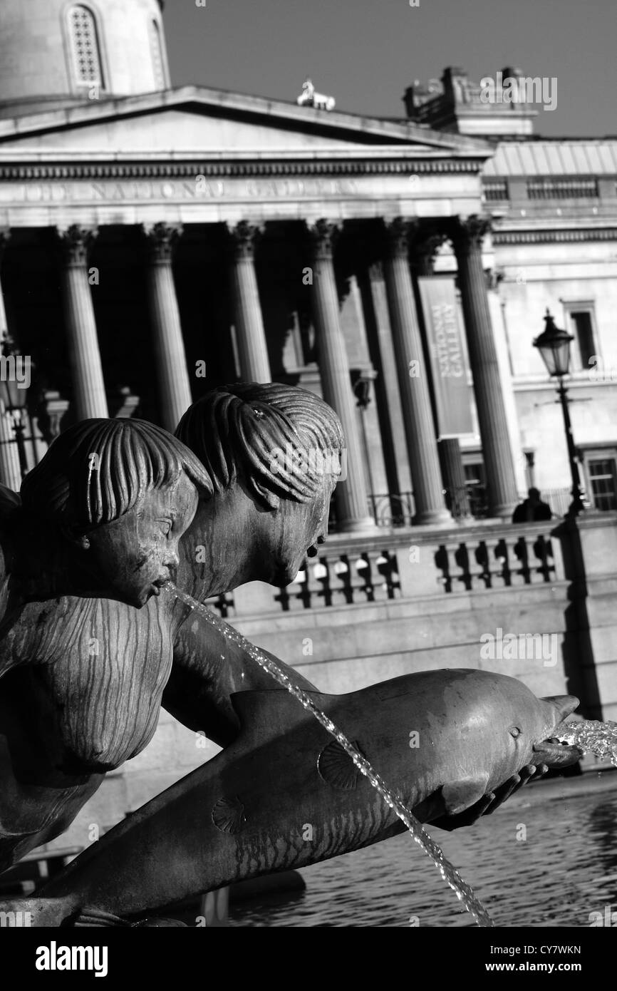 Part of a water sculpture in Trafalgar Square, London, with The ...