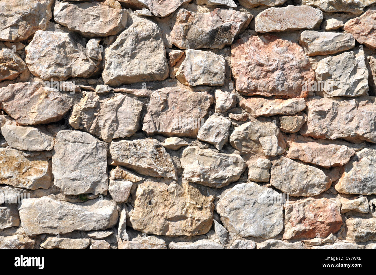 Irregular Natural Stone Wall (textured background Stock Photo - Alamy