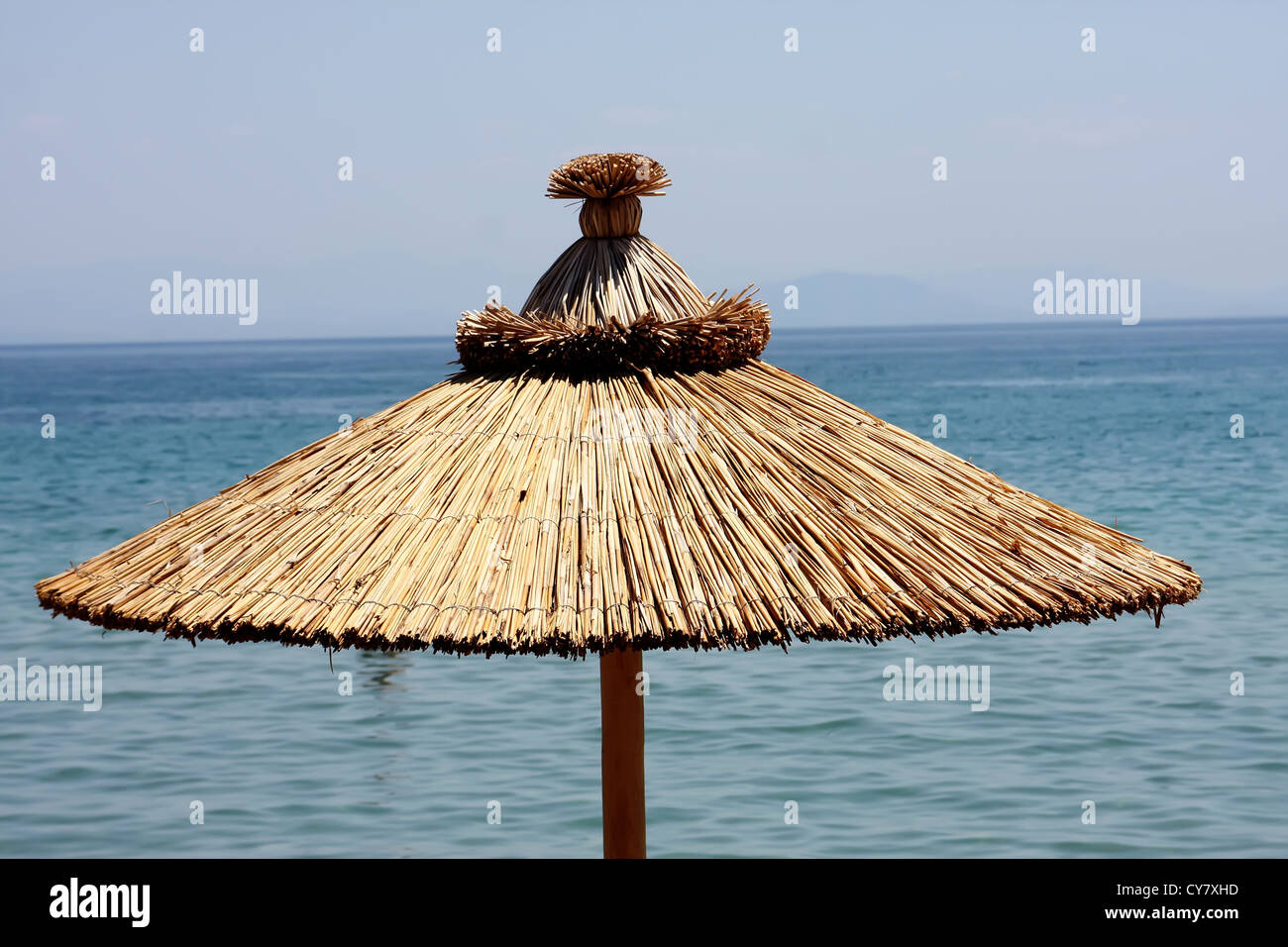 Parasol on a beach Stock Photo - Alamy