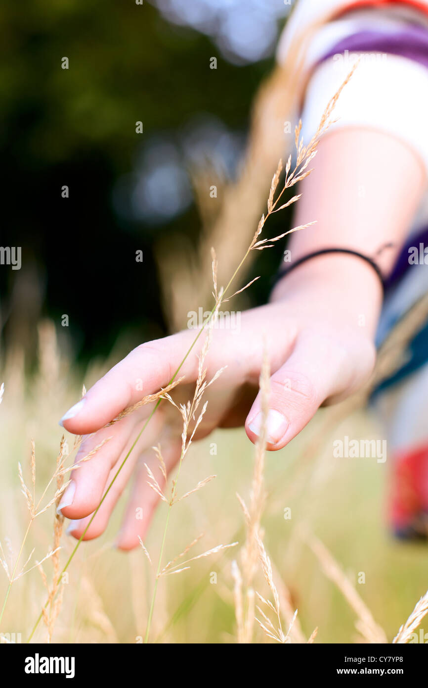Hand in nature Stock Photo - Alamy