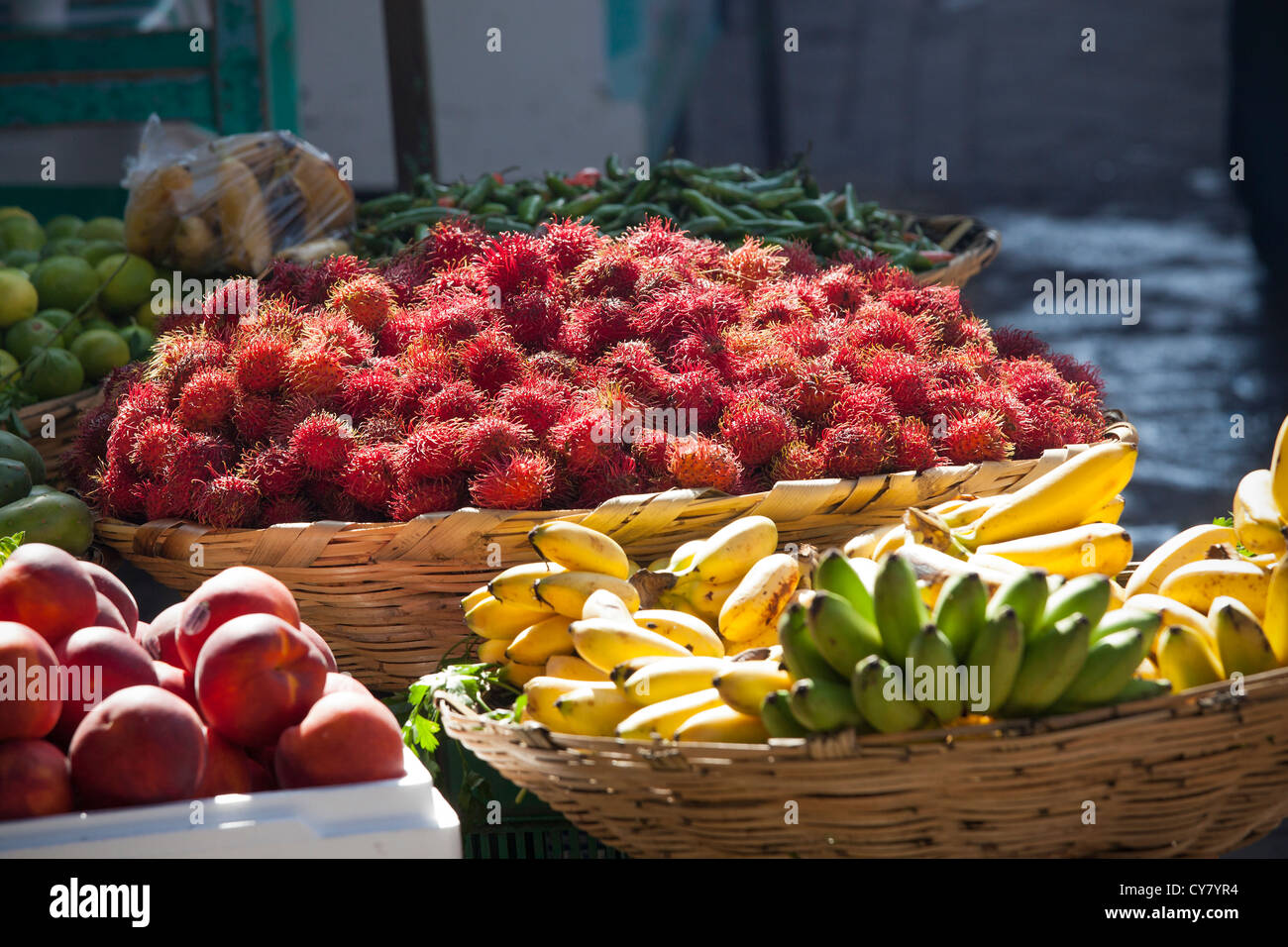 Exotic looking rambutans and other fruit for sale in the Tlacolula ...