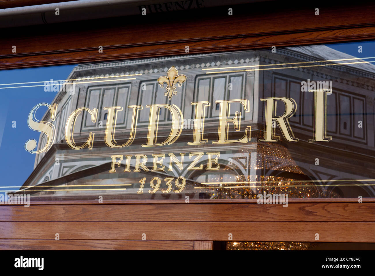 Window of Scudieri cafe with Baptistery and Duomo reflection Florence ...