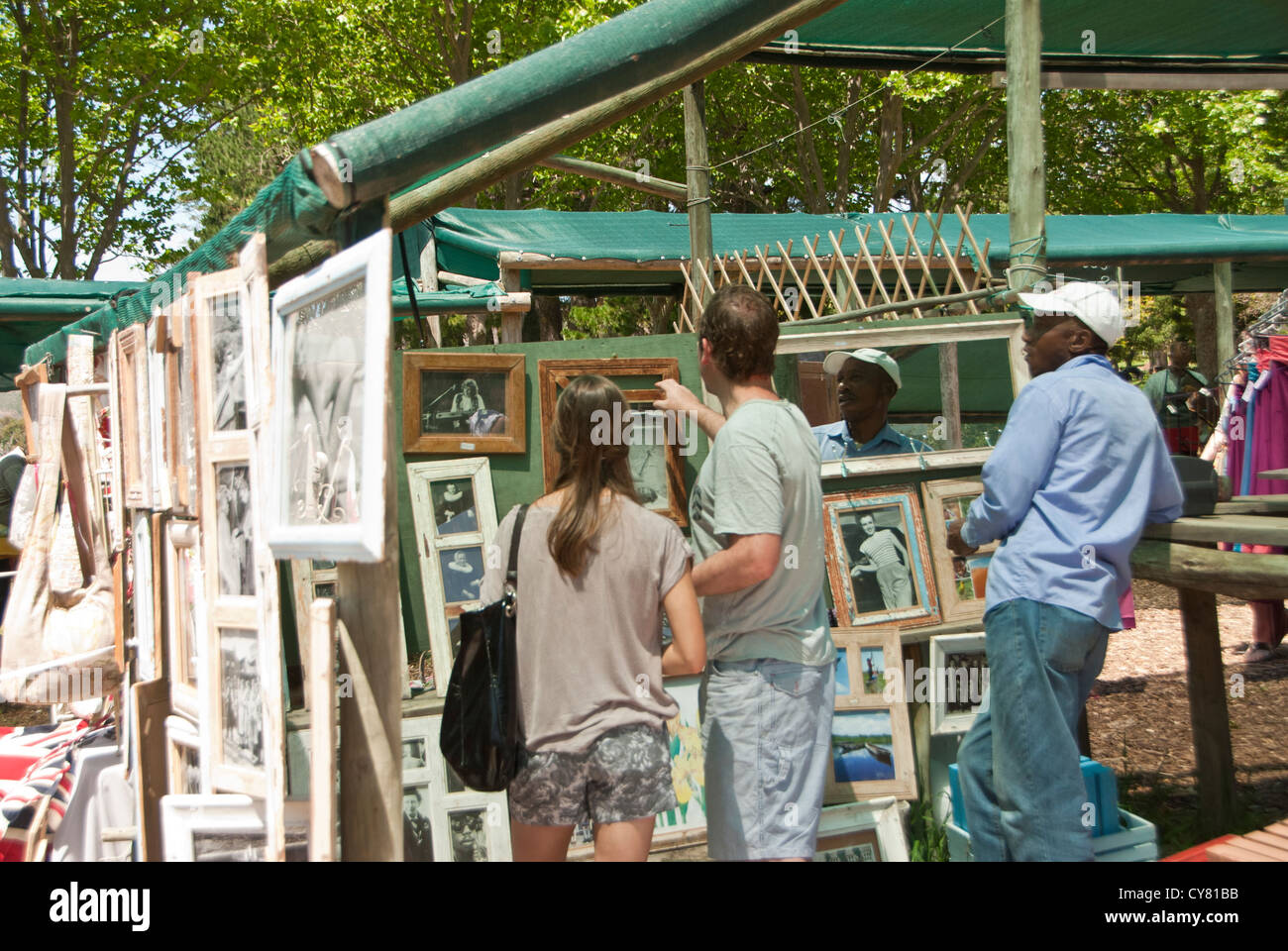 Shoppers at a stall in the popular outdoor Porter's market in Tokai ...