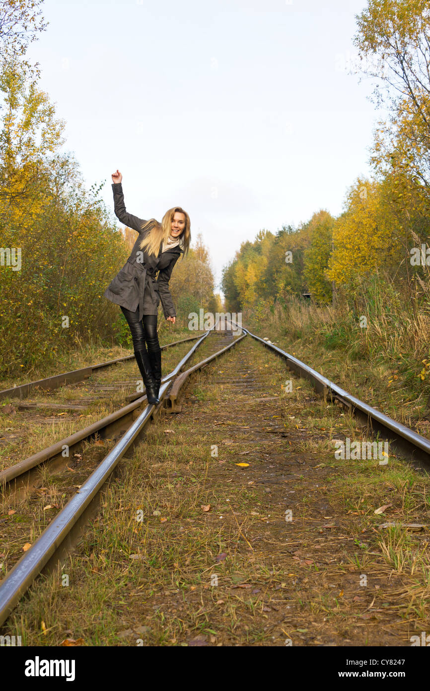 Young pretty woman walks Stock Photo - Alamy