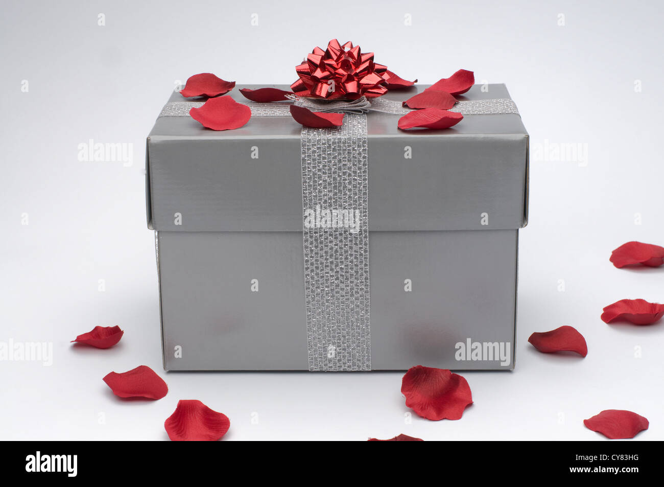 Gray gift box bind with roses Stock Photo - Alamy