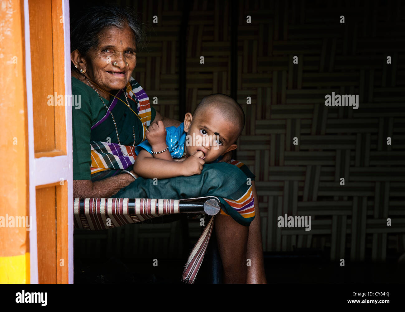 Rural Indian village Grandmother and grandson in there home. Andhra ...