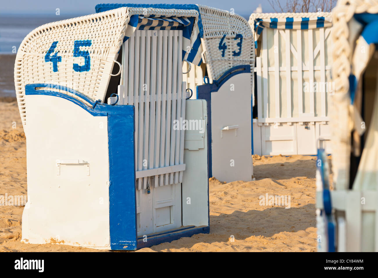 Beach wicker chairs strandkorb in Northern Germany. North sea Stock ...