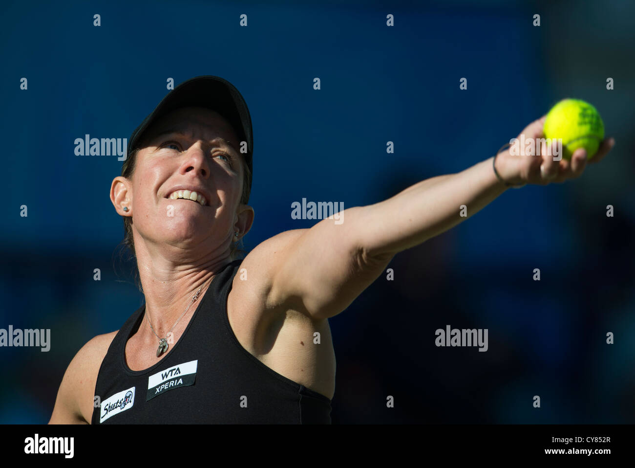 Liezel Huber in action serving during match Stock Photo - Alamy