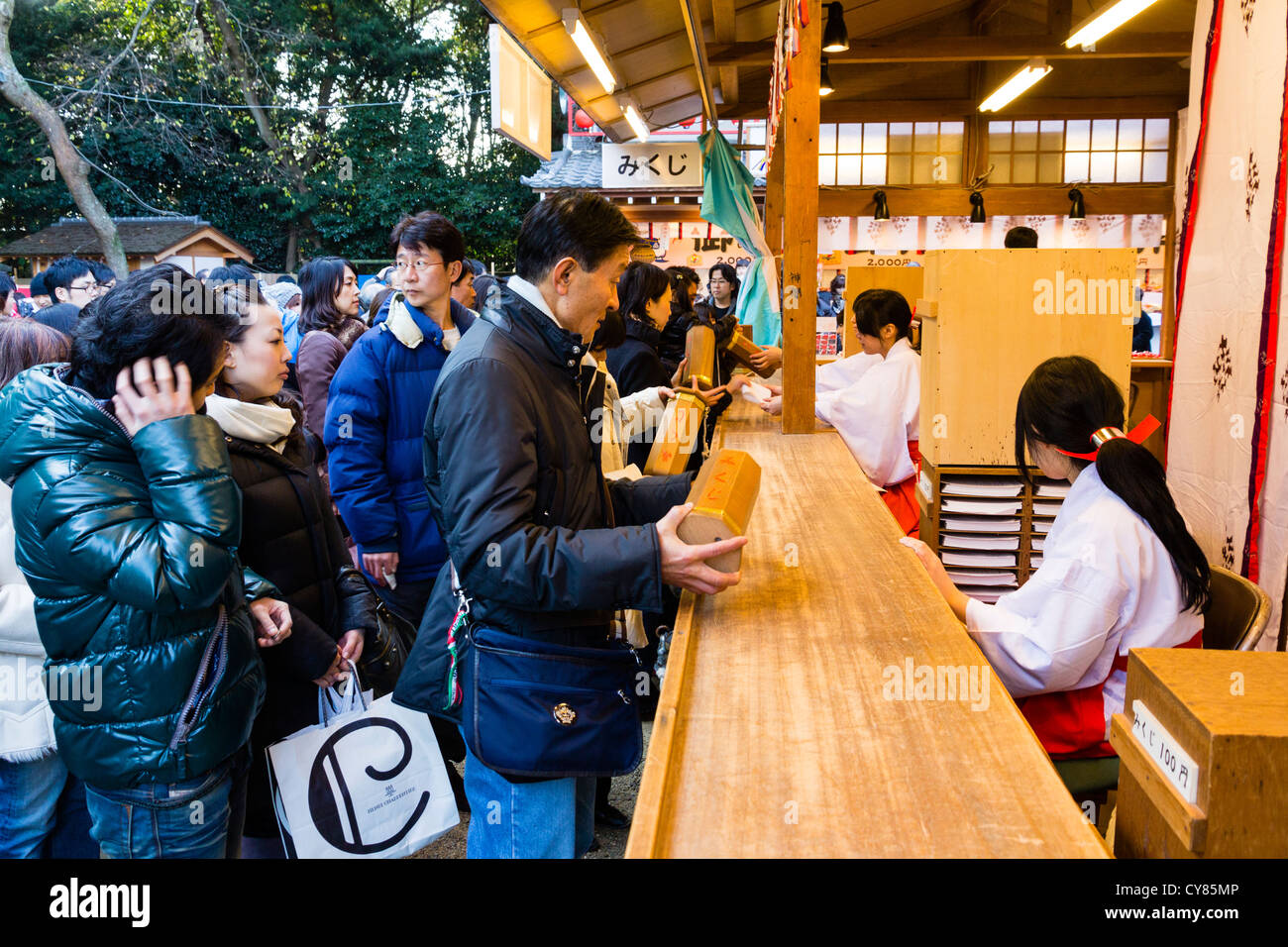 Japan, Nishinomiya shrine, New year's Day, Shogatsu. People buying ...