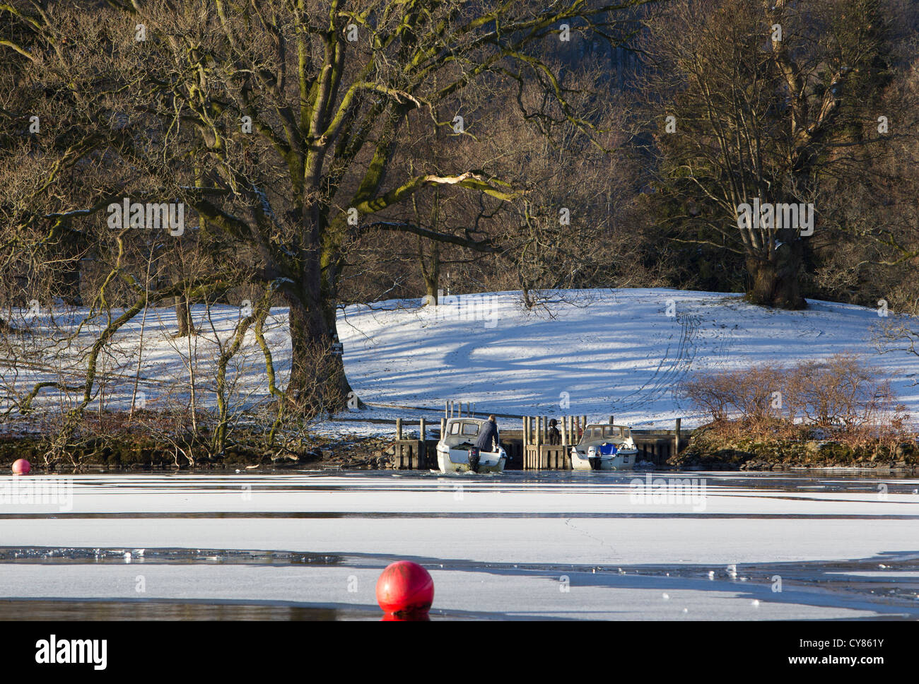 Lake Windermere in the cold winter with snow on the fells- Belle Isle ...