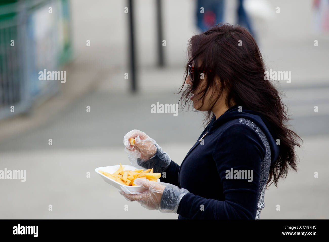 Plastic eating gloves hi-res stock photography and images - Alamy