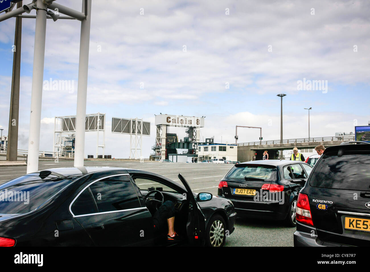 Cars waiting at the ferry terminal ready to board the ship for the ...