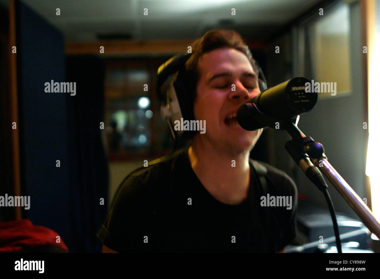 Making music in a music studio Stock Photo - Alamy