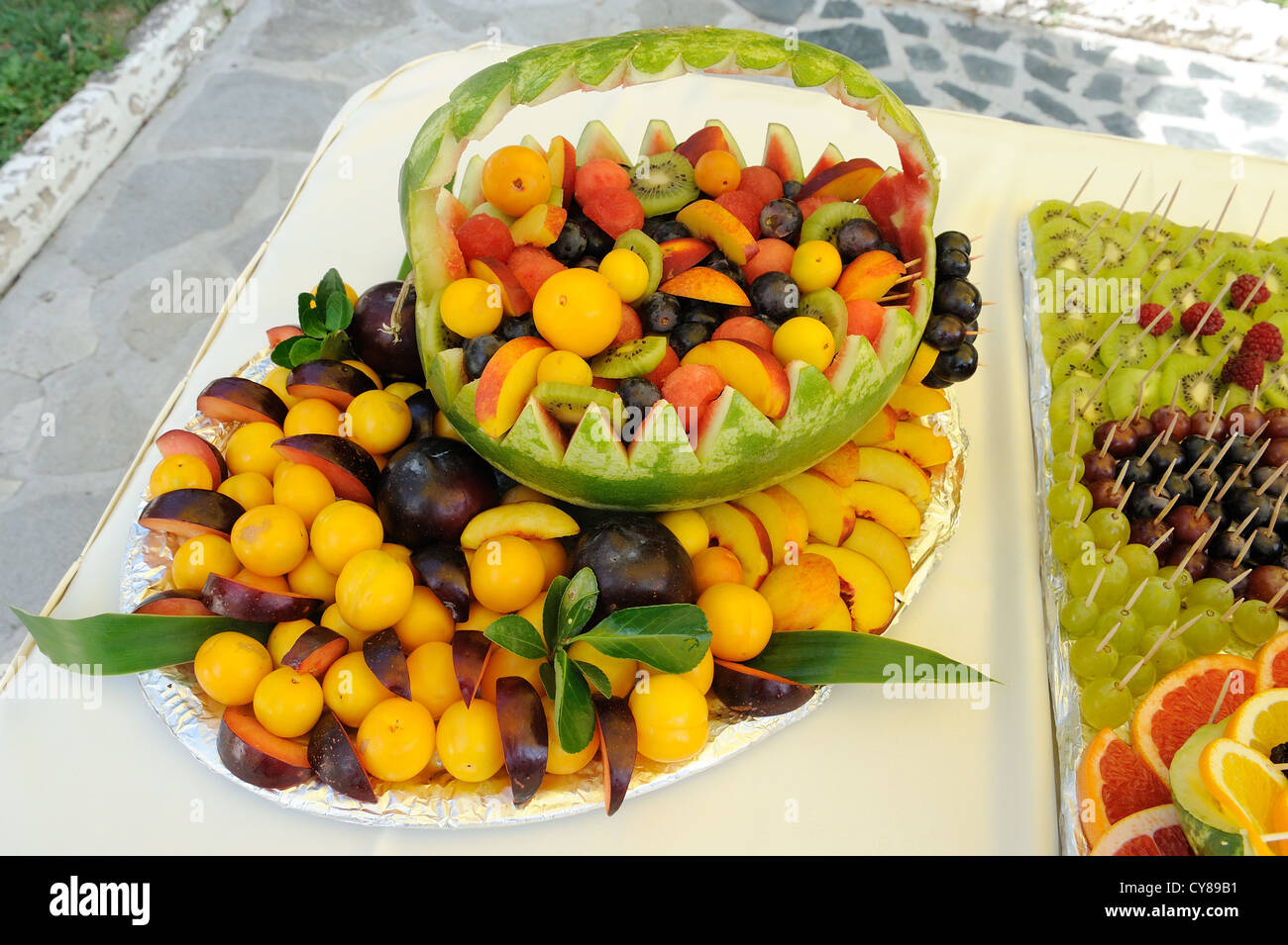 watermelon filled with fruit Stock Photo - Alamy