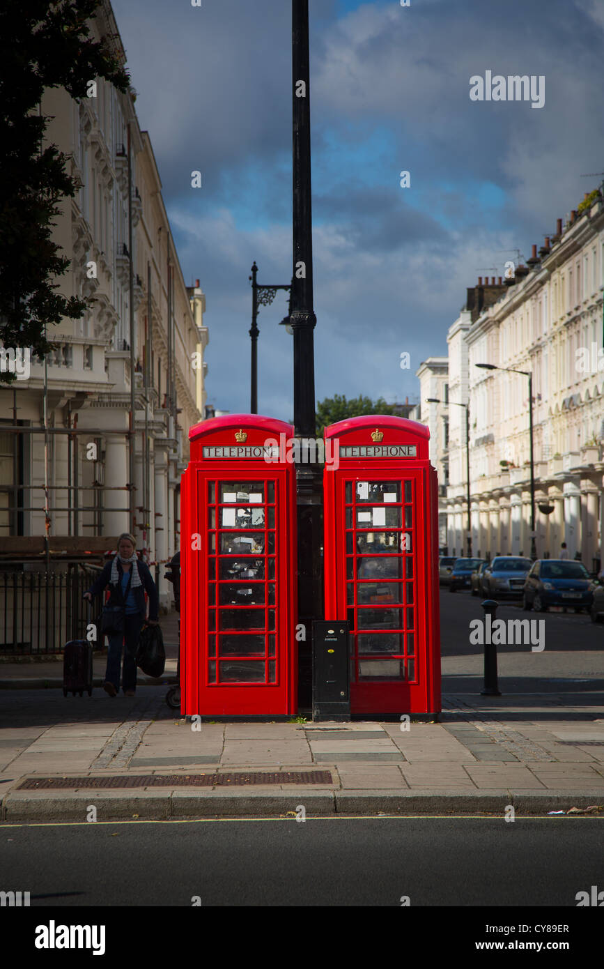 Typical red phone booths in the city of London Stock Photo - Alamy