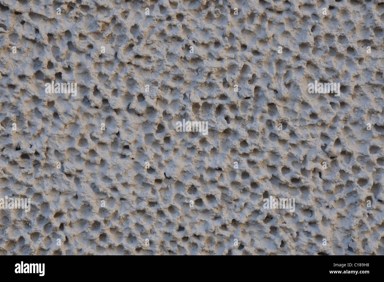 Mottled plaster gray wall background Stock Photo - Alamy