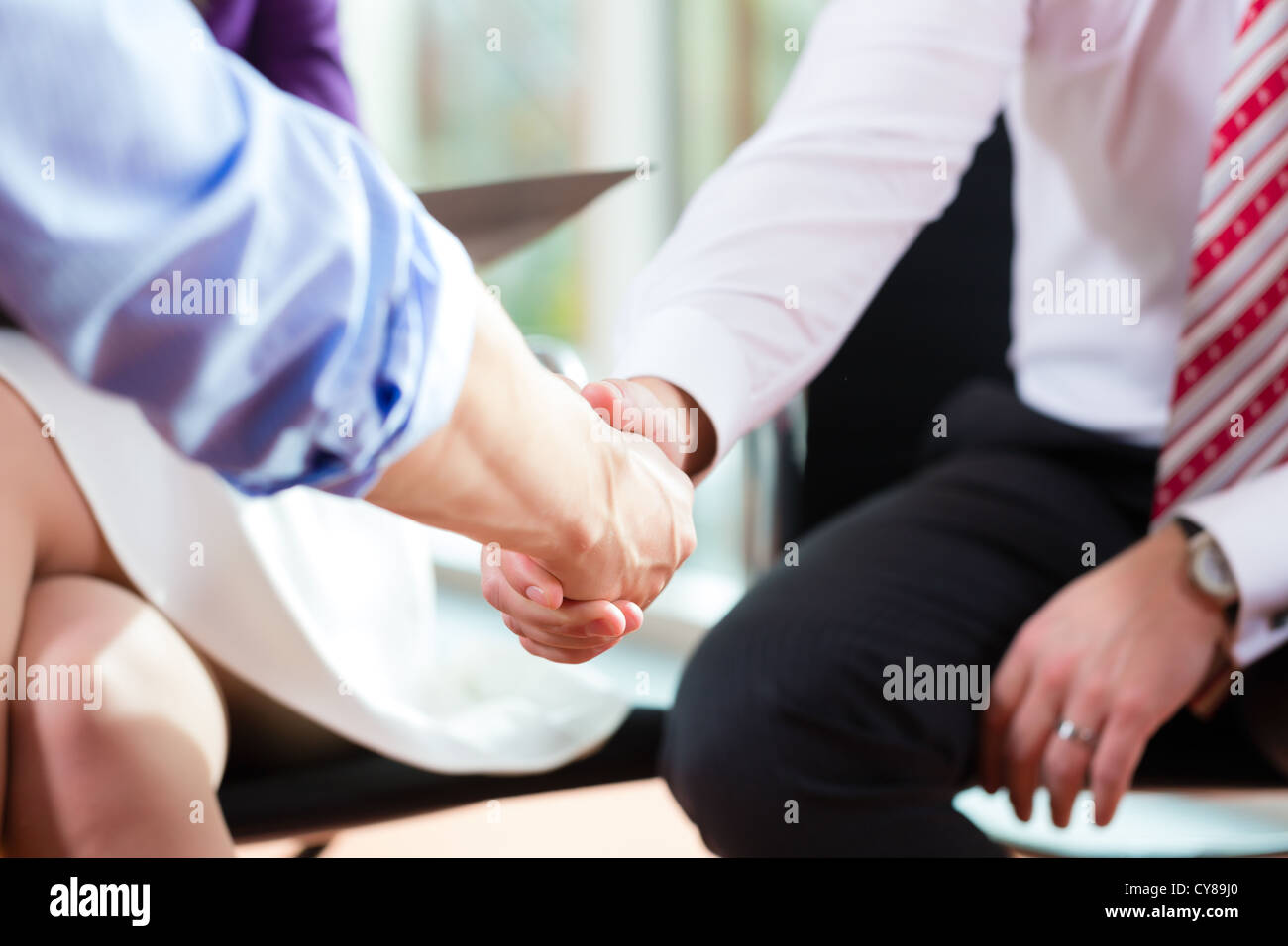 Man shaking hands with manager at job interview closeup cutout ...