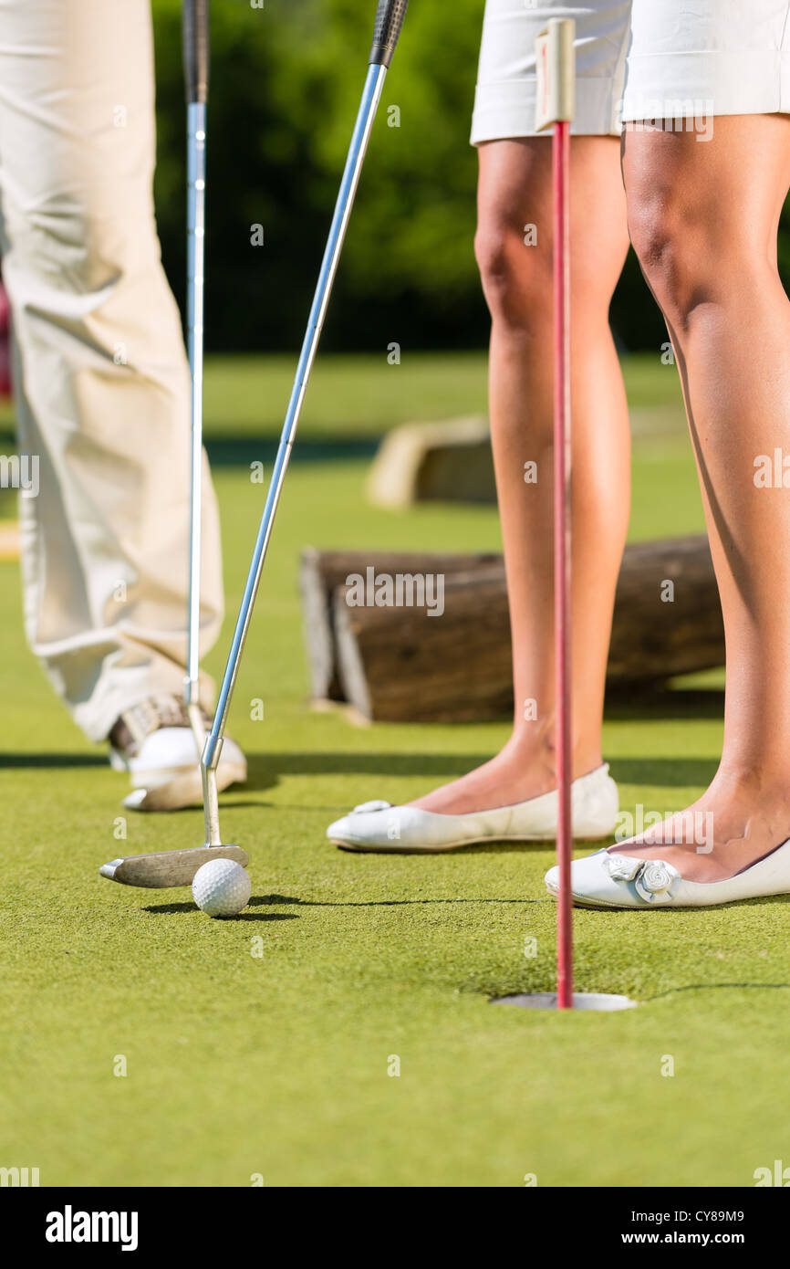 The legs of a woman playing golf hi-res stock photography and images ...