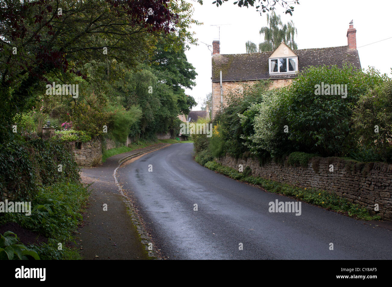 A country lane in Longborough, Gloucestershire, England, UK Stock Photo ...