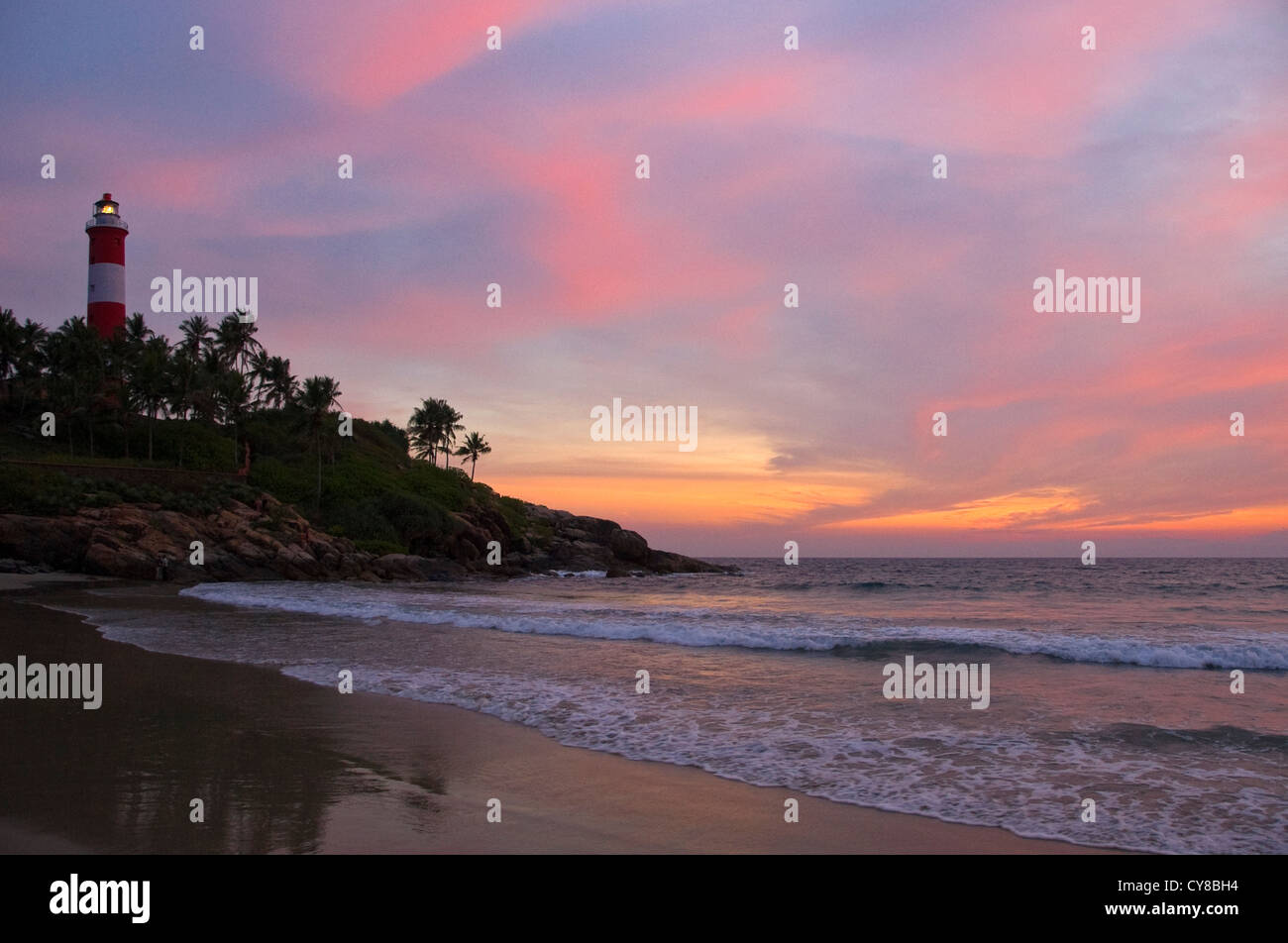 Horizontal view across Lighthouse beach during a spectacular sunset in ...