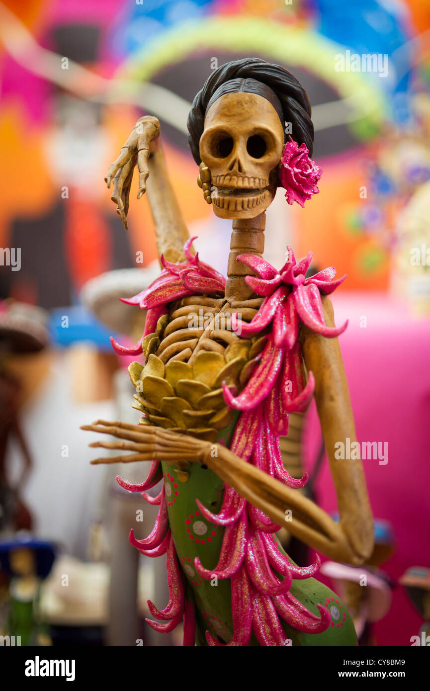 Colorful Catrina made out of mud Stock Photo - Alamy