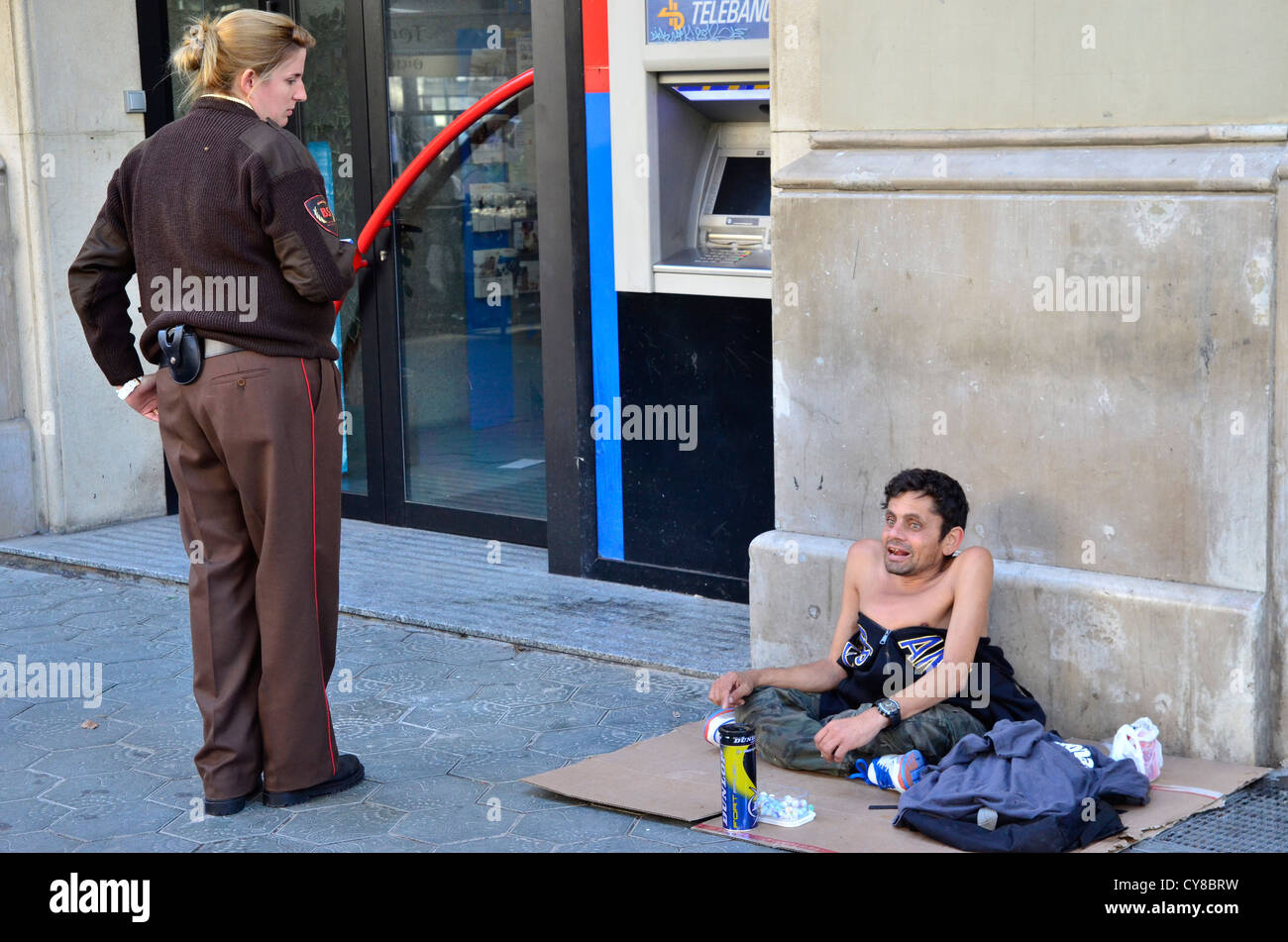 Homeless being harassed by security guard Stock Photo - Alamy