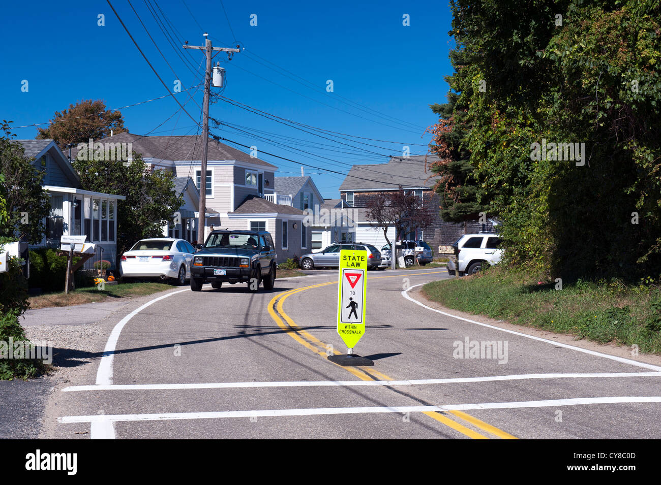 "Yield to pedestrians within crosswalk" sign in Wells Beach, Maine, USA ...