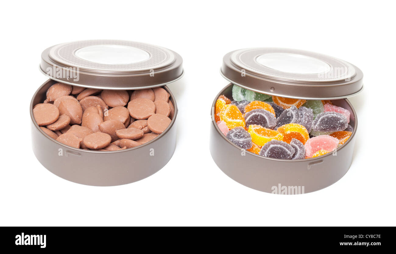 Colorful Jelly and Chocolate Candies in tin cans, on white background ...