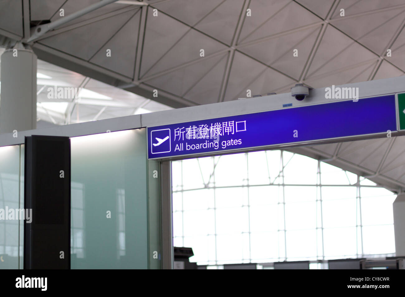 Hong Kong International Airport entrance to all boarding gates. Sign is ...