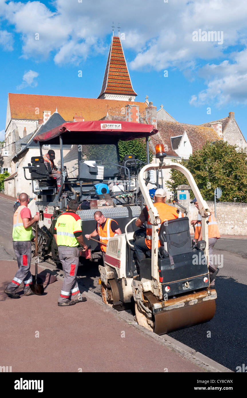 Tarmac laying machine and light roller in operation - France Stock ...